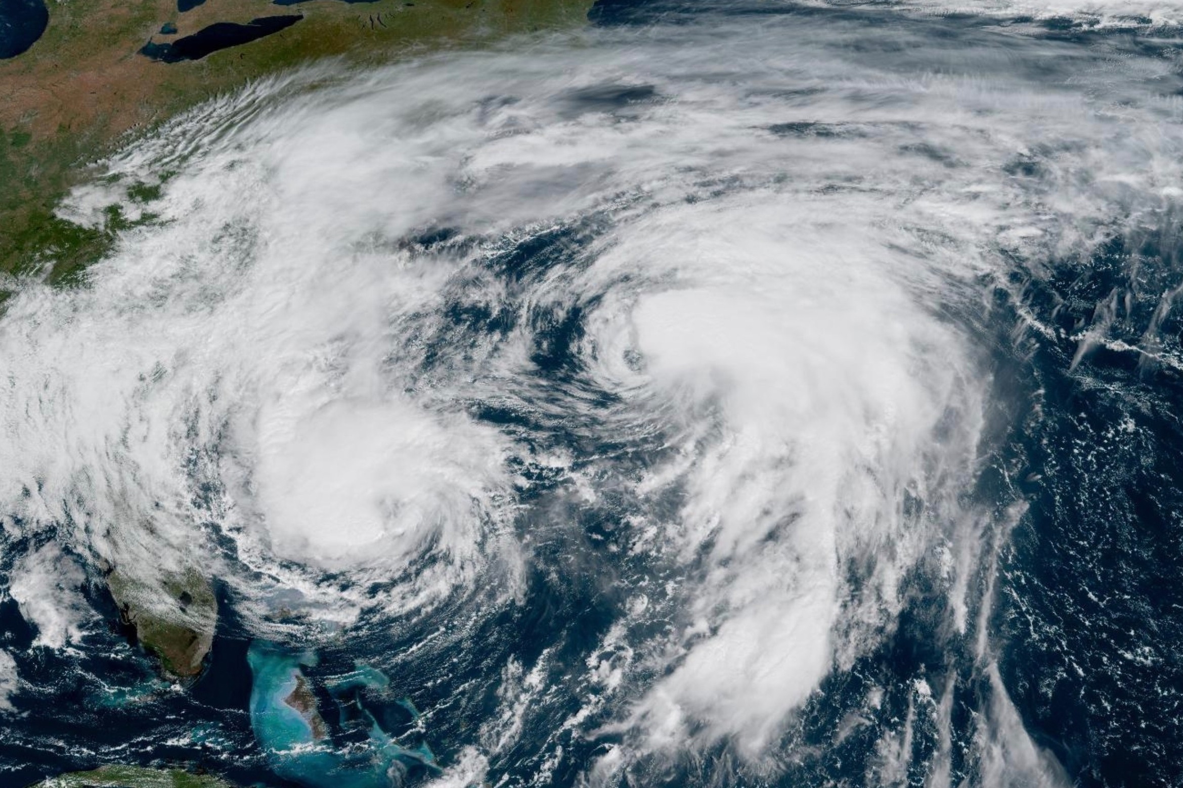 Two hurricanes interact in the North Atlantic, creating a rare ...