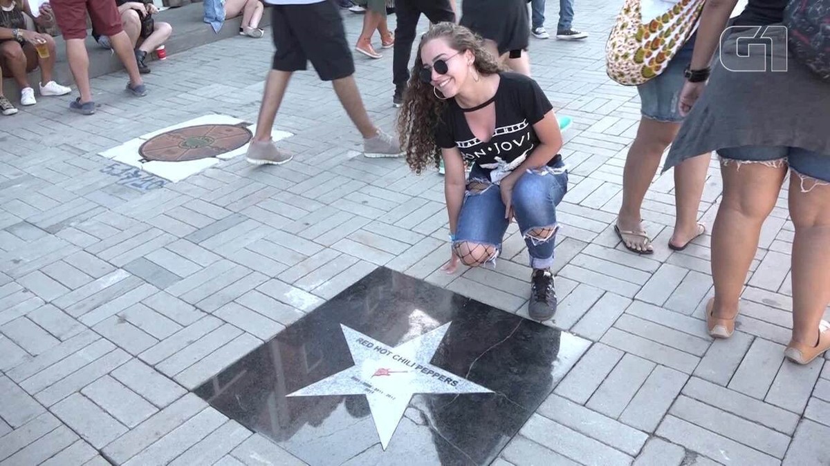 Calçada e Parede da Fama viram 'points' de fotos para público do Rock ...